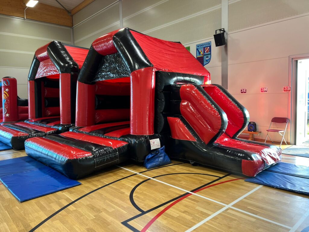 Shiny Red & Black Castle With Slide - Jolly Kids Castles