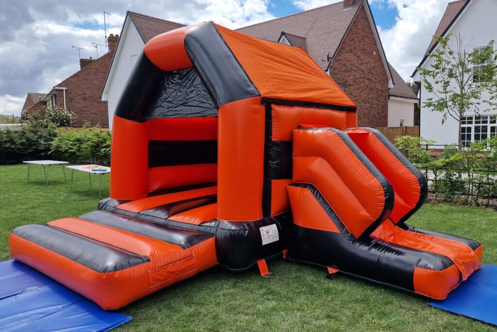 Shiny Orange & Black Castle With Slide - Jolly Kids Castles