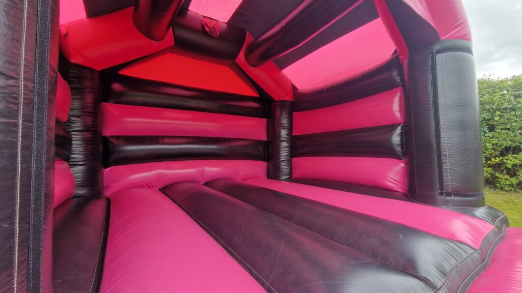 Shiny Pink & Black Adult Castle - Jolly Kids Castles